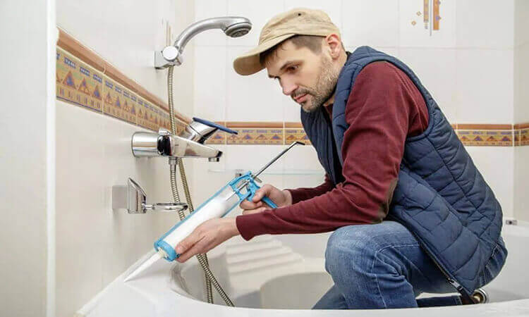 Bathtub Caulking Tutorial: From Removal to Re-Caulking - Giving Tree